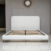 China Sophisticated Textured Upholstered Bed Blends Soft Fabric with Sleek Structural Elements for sale