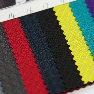 China 100% Nylon Ripstop Bag Fabric Diamond Chessboard Grid Pattern Nylon Woven Fabric for sale