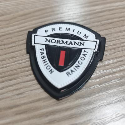 China Custom Design Round Free Design Garment Labels and TPU Badges for Multi-Usage Clothing and Accessories for sale