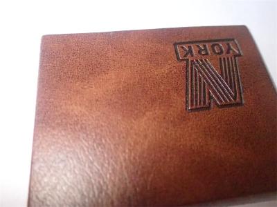 China Custom Leather Label Design Clothing Embossed Leather Patches For Garment for sale