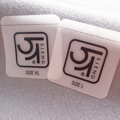 China Transparent Soft TPU Clothing Labels CMYK Colors Washable For Swimwear for sale