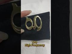 Waterproof Custom 3D TPU Heat Transfer Gold Clothing Patches High Frequency Log