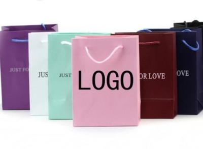 China Colorful Custom Printed Paper Gift Bags For Clothes Packaging Eco Friendily for sale