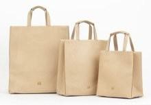 China Kraft Paper Printed Shopping Bags With Handles , Paper Merchandise Bags With Logo for sale