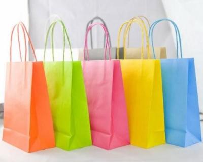 China Multi Colored Paper Garment Bags with Handle Custom Logo Printed Accepted for sale
