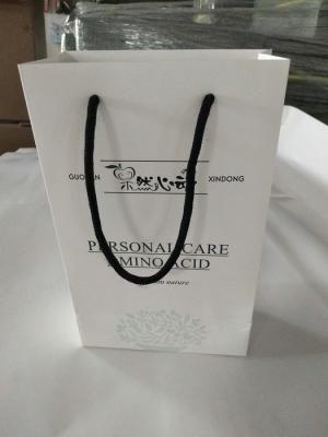 China Promotional Printed Paper Shopping Bags , Printed White Paper Bags With Handles for sale