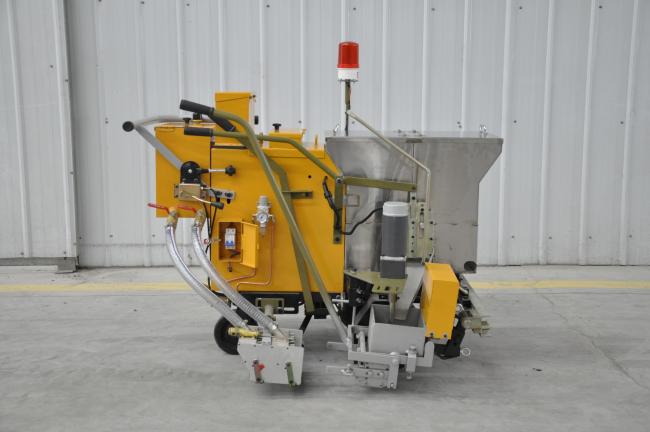 Two Component Road Marking Machine in operation