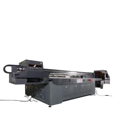 China Betcolor 1.3m 16 heads Large format UV flatbed printer CMYK 1024A print head Banner Car Wrap Printing Machine for sale