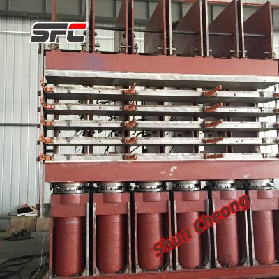 China 5 Working Layers 12MN Total Pressure Fully Automated Tire Tread Vulcanizing Machine for Rubber Tire Tread Press for sale