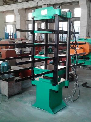 China Rubber Tile Vulcanizing Press with 4 Working Layers 400X400X45 mm Plate Size and Manual Push-Out Device for sale