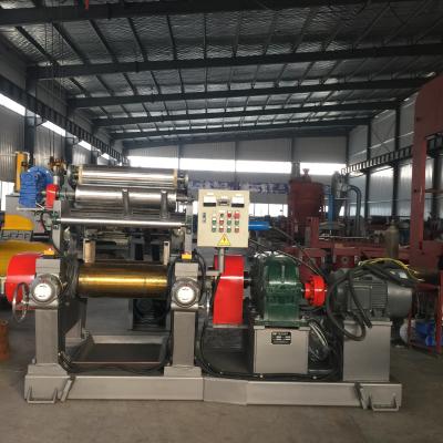China XK-560 Rubber Mixing Machine with 560mm Roll Diameter 90kW Motor Power and PLC Control Open Mixing Mill for sale