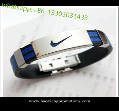 China Eco-friendly 100% Custom silicone wristband/bracelets with debossed logo for sale