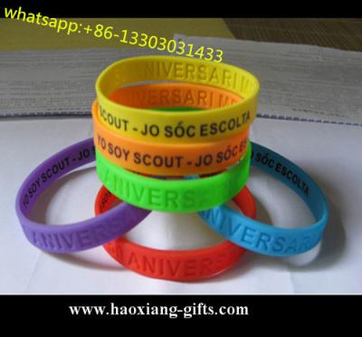 China embossed/debossed/printed Silicone wristband color infilled in customer's design for sale