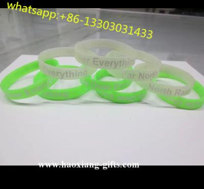 China popular cheap promotional uv sensitive sport silicone bracelet with custom logos for sale
