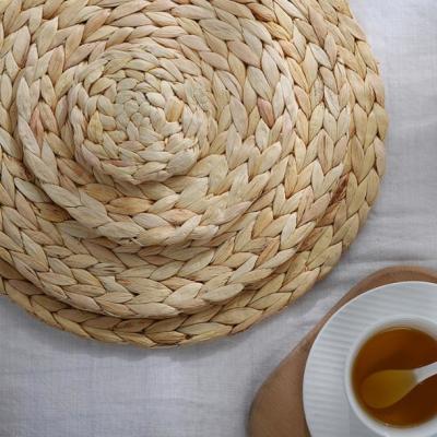 Cina Stuoie di posto tessute sottopiatti di Hyacinth Placemats Round Braided Rattan dell'acqua in vendita