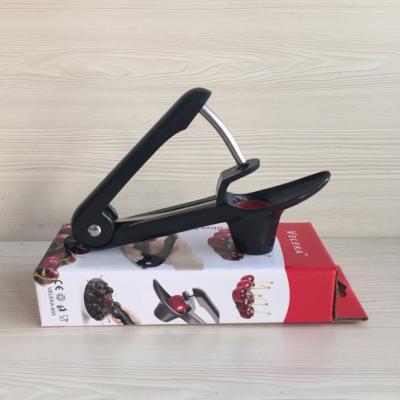 Cina Strumento di Cherry Pitter Olive Seed Remover con la tazza di categoria alimentare del silicone in vendita