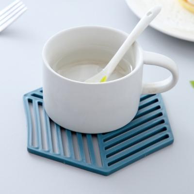 Cina Strumento multifunzionale della cucina di calore di esagono delle stuoie di treppiedi del silicone e dei cuscinetti caldi per le stuoie della ciotola in vendita