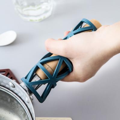 Cina Strumento multifunzionale della cucina di calore di esagono delle stuoie di treppiedi del silicone e dei cuscinetti caldi per le stuoie della ciotola in vendita