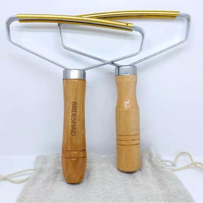 Cina Vestiti di lana Cat Hair Scraper della ruspa spianatrice del residuo di stoffa del tappeto del tessuto della lanugine in vendita