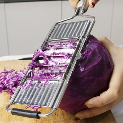 Cina Grattugia di verdure tenuta in mano dell'affettatrice di acciaio inossidabile della taglierina di multi scopo in vendita