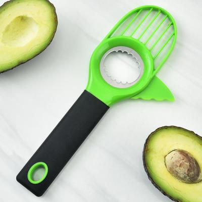 Cina Cucina 3 in strumenti di plastica di 1 dell'avocado della taglierina del coltello dei levatorsoli dell'avocado avocado dell'affettatrice in vendita