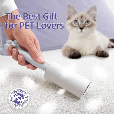 Cina Il rullo appiccicoso di plastica di Cat Paw Shaped Lint Remover Roller per i vestiti ricopre le sedi di automobile in vendita
