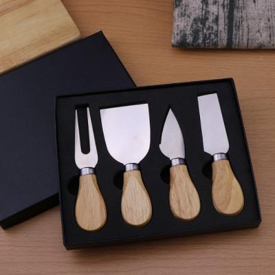 Cina coltelli del formaggio di 4pcs 6pcs messi con la taglierina di formaggio di legno di acciaio inossidabile della maniglia in vendita