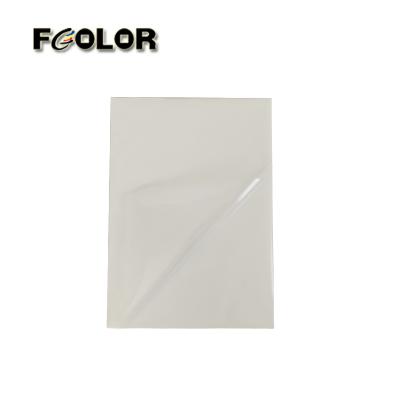 China Waterproof PET Self Adhesive Vinyl Custom Clear Bottle A4 Transparent Label Sticker Paper for sale