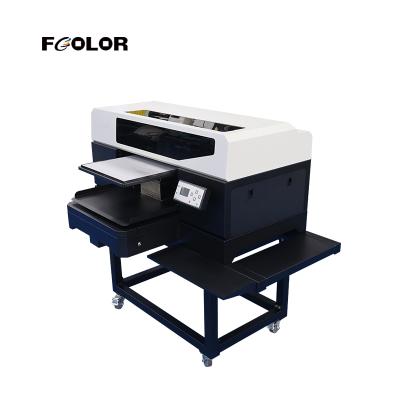 China Automatic Direct To Garment Printing Machine A3 A4 Size 6 Colors DTG T Shirt Printer for sale