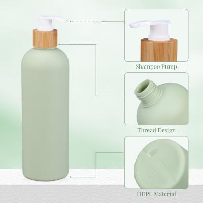 China Shampoo Bottle with Bamboo Lid HDPE Plastic Type Soft Touch Empty Body Lotion Container for sale