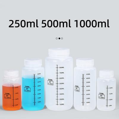 China New Design Graduated Bottle Food Grade PP Clear Plastic Bottle With Scale Line Wide Neck Liquid Container for Chemical for sale