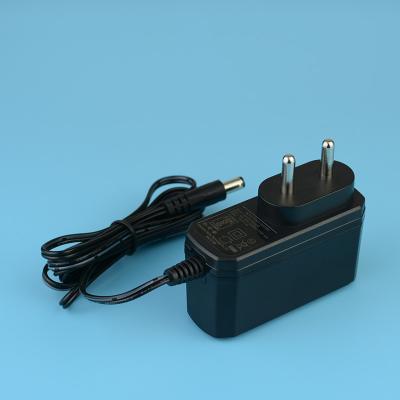 China High Efficiency LEVEL VI 6V 1.5A Universal AC DC Power Adapter For Reading Pen / Hair Clipper for sale