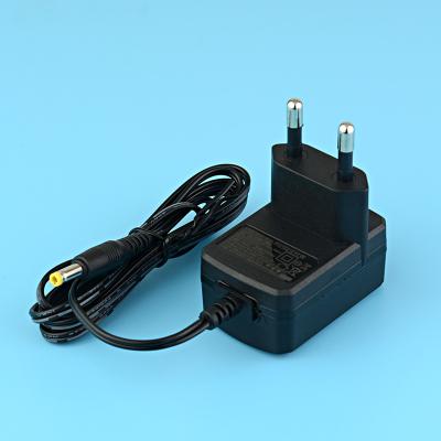 China Plug In Wall Mount Ac Dc Power Adapters 5V 9V 12V With EU UK US AU Korea Plug for sale