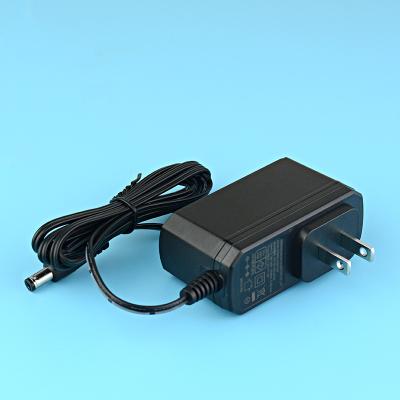 China Wall Mounted Switching AC DC Power Adapter 12W 15W 12V 15V 1A 1.5A BIS Approval for sale