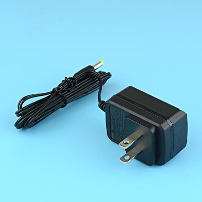 China EU US UK AU JP KR IN Plug Switching AC DC Power Adapter 9V 15V 0.75A 0.8A Long Lifespan for sale