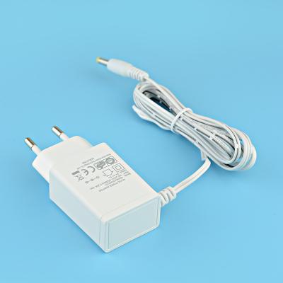 China Plug In Bluetooth Universal Ac Dc Power Adapter 5 Volt 2 Amp EU US AC DC Type for sale