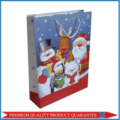 China Christmas Theme Paper Gift Bag with Custom Color Artwork Printing for sale