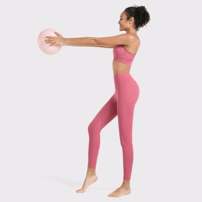 Cina Set da yoga in 2 pezzi da donna tinta unita Sexy reggiseno incrociato sul retro Abbigliamento sportivo Leggings da yoga in vendita