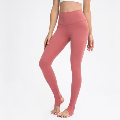 Cina Gli sport Capri di colore solido ansima le alte ghette adatte esili di yoga di Waisted con le tasche in vendita
