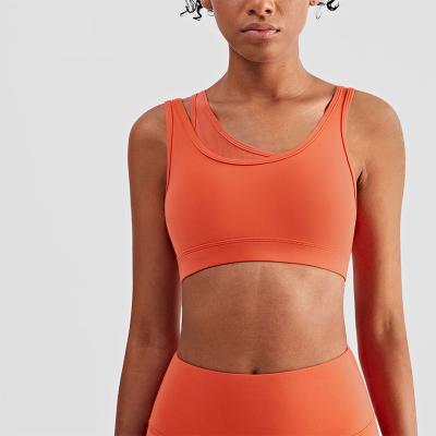 Cina Cima riempita inferiore elastica del raccolto delle ragazze del reggiseno di Mesh Stitching Strappy Back Sports in vendita