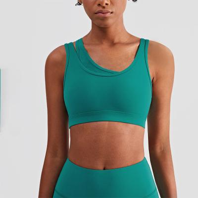 Cina Cima riempita inferiore elastica del raccolto delle ragazze del reggiseno di Mesh Stitching Strappy Back Sports in vendita