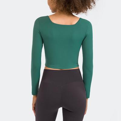 Cina Le camice delle alte donne lunghe elastiche della manica delle cime di yoga delle signore con il reggiseno in vendita