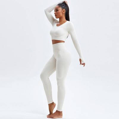 Cina Set da yoga femminile estensibile Abbigliamento Leggings con top corto a costine da corsa senza cuciture in vendita