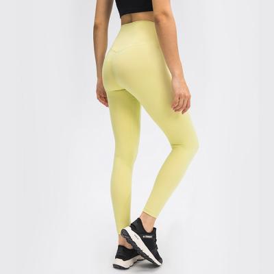 Cina Pantaloni ritenenti nudi di yoga della tasca 7/8 alta di ghetta della palestra di Waisted delle signore in vendita