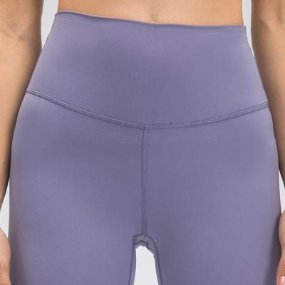 Cina Pantaloni ritenenti nudi di yoga della tasca 7/8 alta di ghetta della palestra di Waisted delle signore in vendita