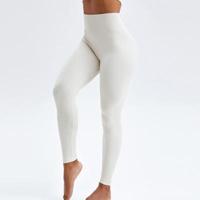 Cina Gli alti pantaloni senza cuciture di yoga di compressione di Waisted confinano le calzamaglia dell'allenamento delle donne di sollevamento in vendita