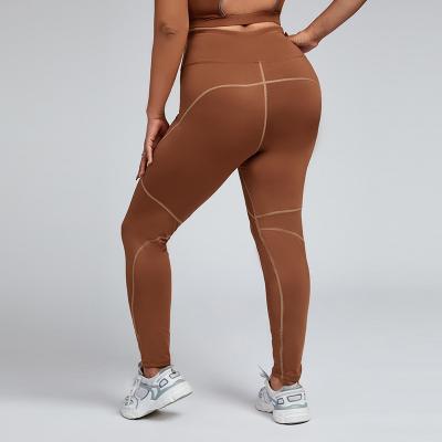 Cina Stretto sexy più l'allenamento respirabile elastico di sollevamento dell'anca dei pantaloni di yoga di dimensione in vendita