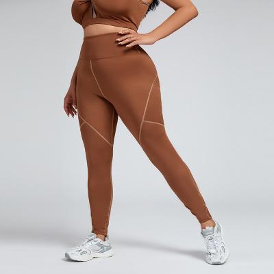 Cina Stretto sexy più l'allenamento respirabile elastico di sollevamento dell'anca dei pantaloni di yoga di dimensione in vendita