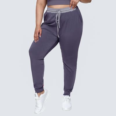 Cina Essiccazione rapida sciolta più i pantaloni di yoga di dimensione che eseguono i pantaloni casuali di sport del cordone in vendita