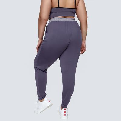 Cina Essiccazione rapida sciolta più i pantaloni di yoga di dimensione che eseguono i pantaloni casuali di sport del cordone in vendita